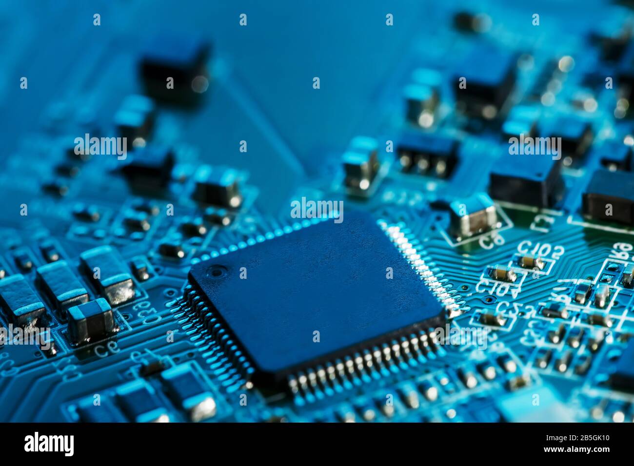 Electronic circuit board close up. Processor, chips and capacitors ...