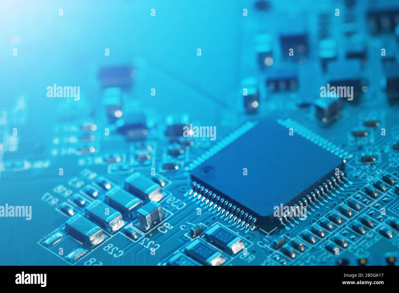 Electronic circuit board close up. Processor, chips and capacitors ...
