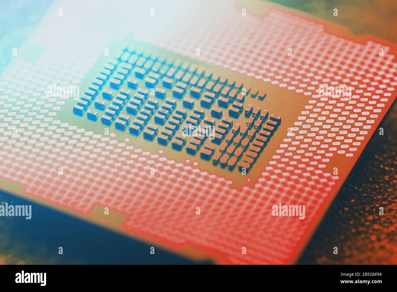 The central processor on the computer motherboard in red colors. PC ...