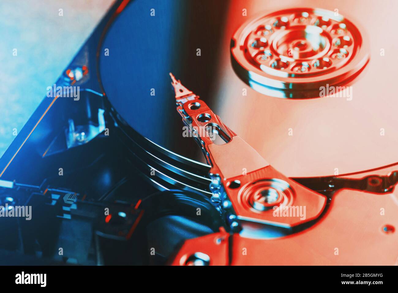 The hard disk from the computer HDD is red, with a mirror effect. The ...
