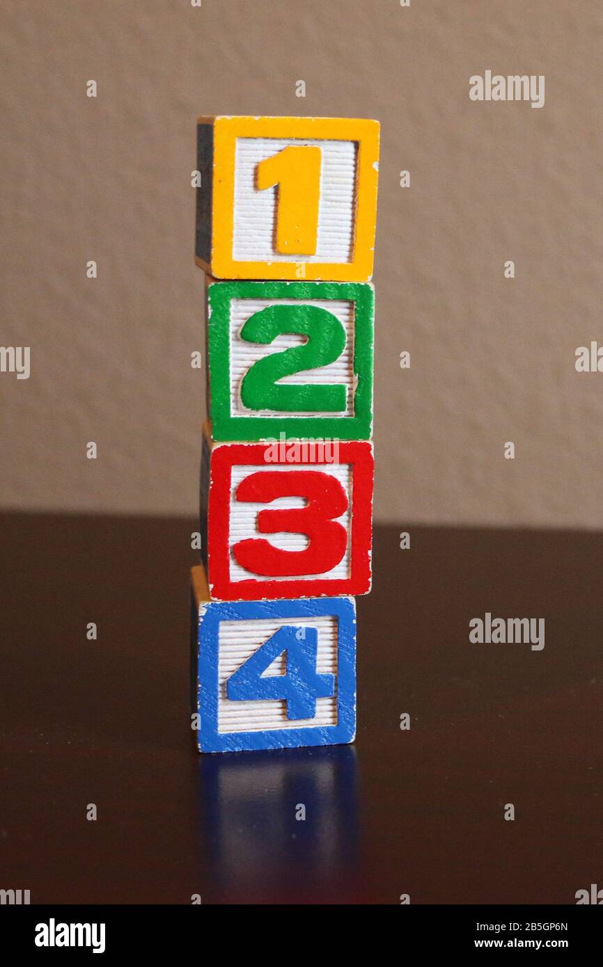 Stack of colored alphabet wooden toy blocks on background Stock Photo ...