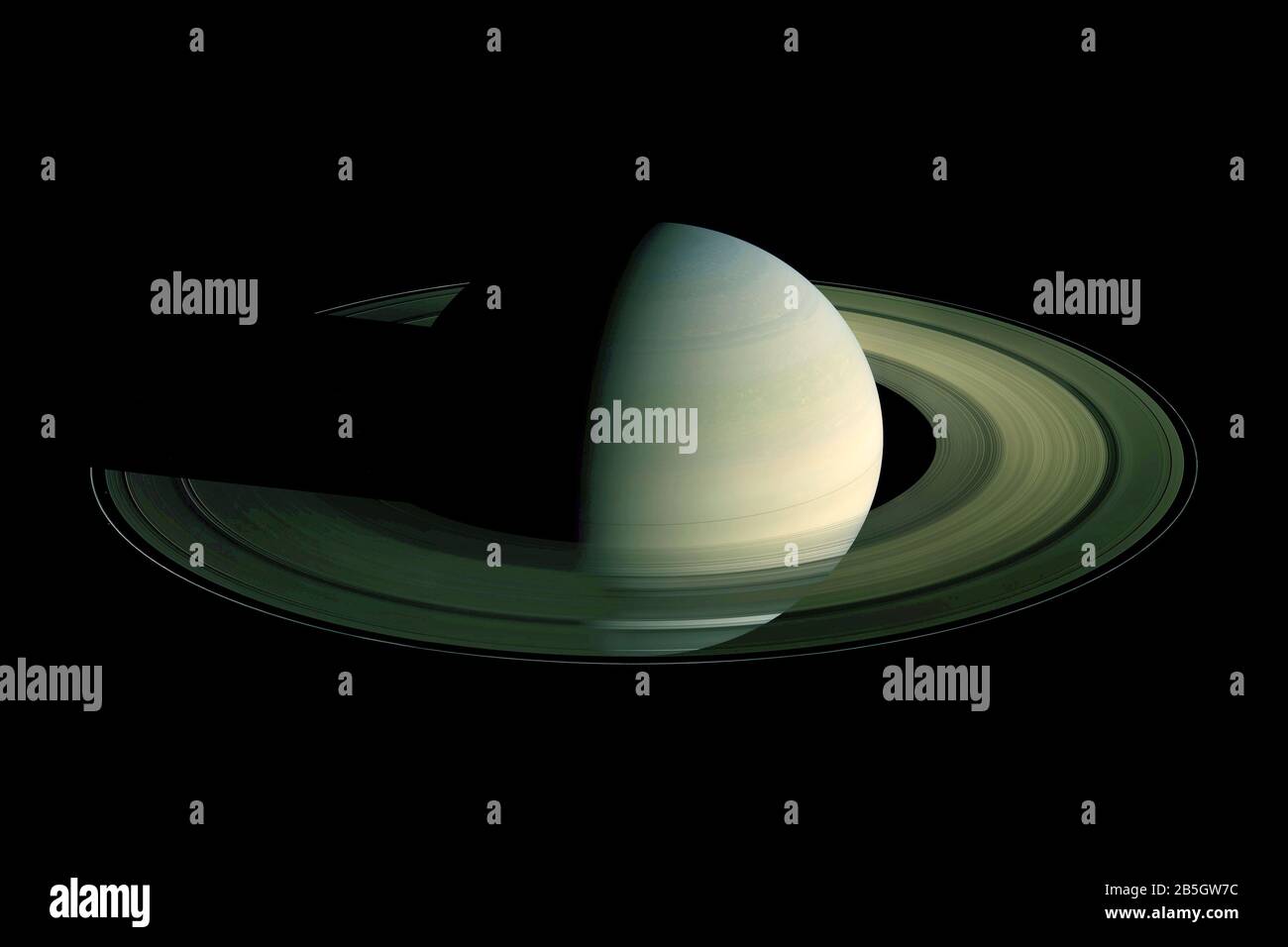 Saturn in unusual colors, on a dark background. Elements of this image ...