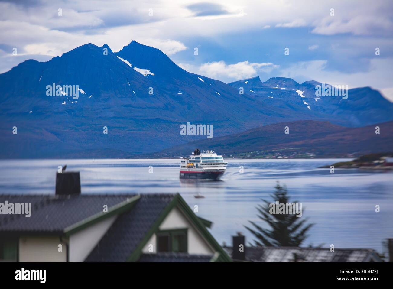 View of Tromso, with cathedral, Tromso Bridge, Tromsoya island ...