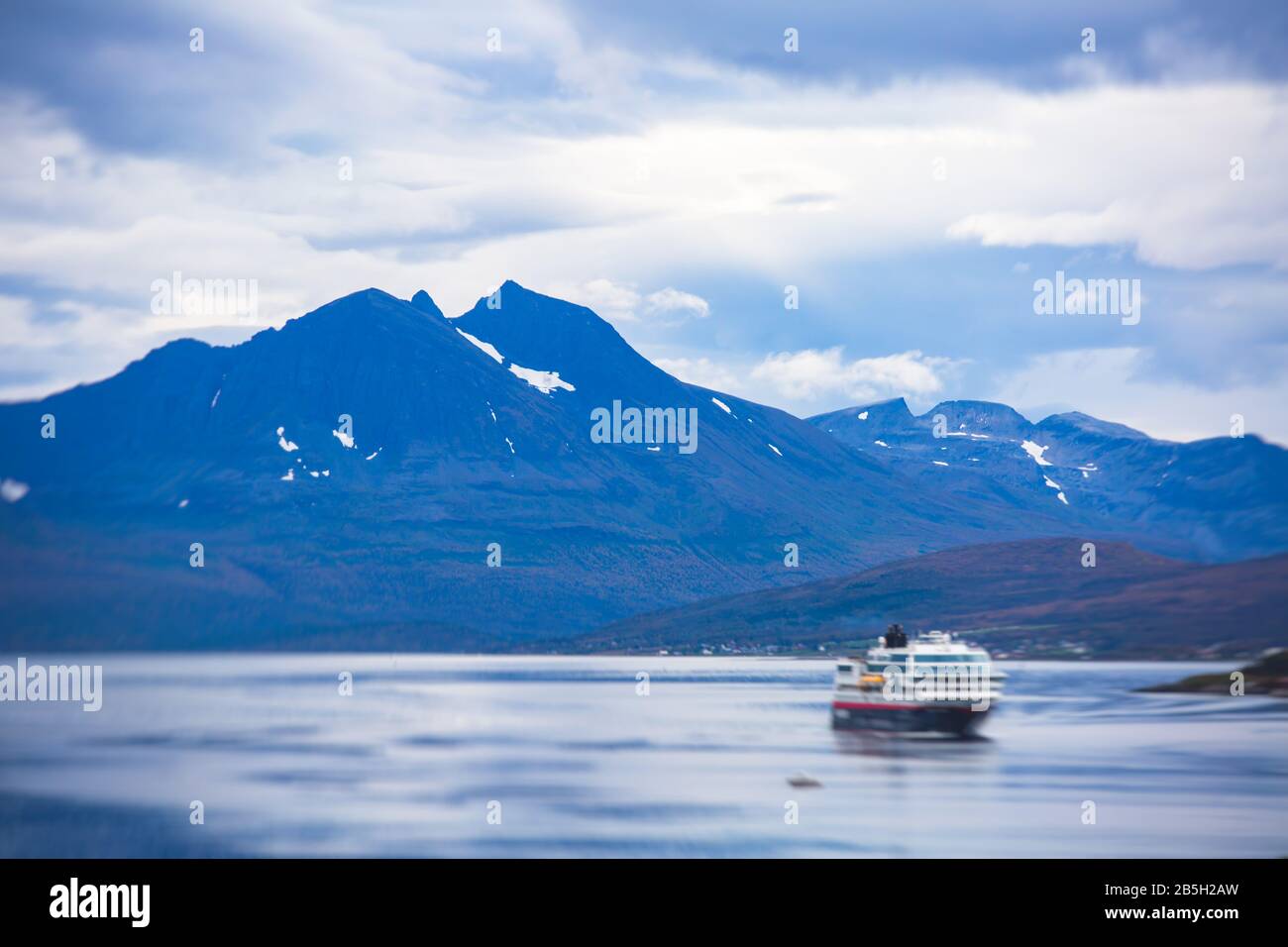 View of Tromso, with cathedral, Tromso Bridge, Tromsoya island ...