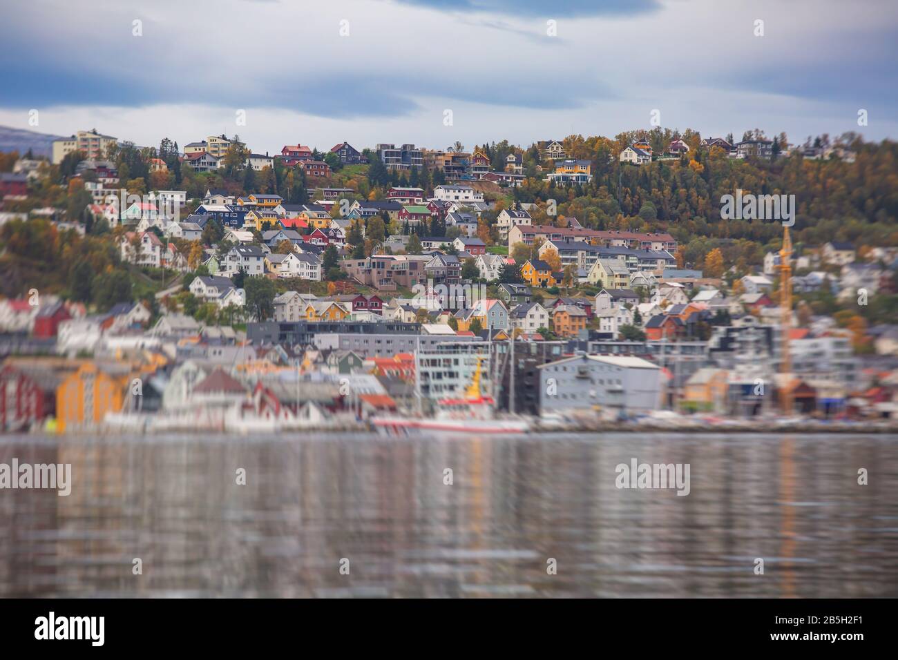 View of Tromso, with cathedral, Tromso Bridge, Tromsoya island ...