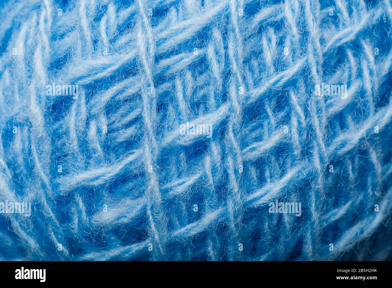 Wool yarn close-up colorful blue threads for needlework in macro ...