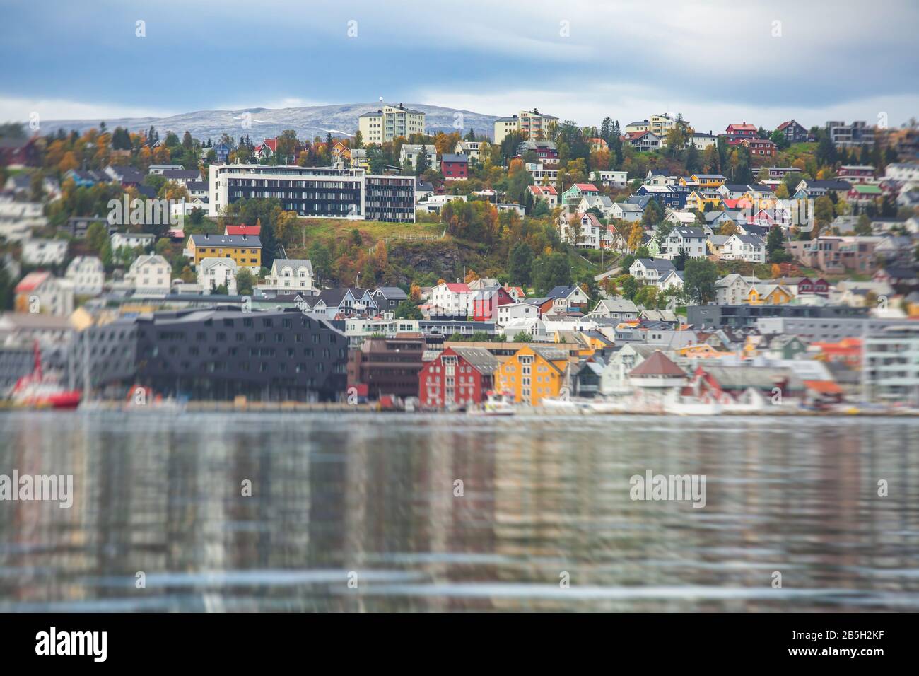 View of Tromso, with cathedral, Tromso Bridge, Tromsoya island ...