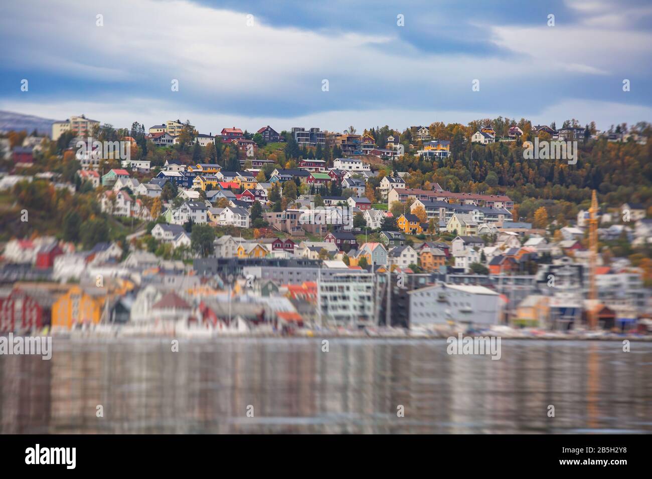 View of Tromso, with cathedral, Tromso Bridge, Tromsoya island ...