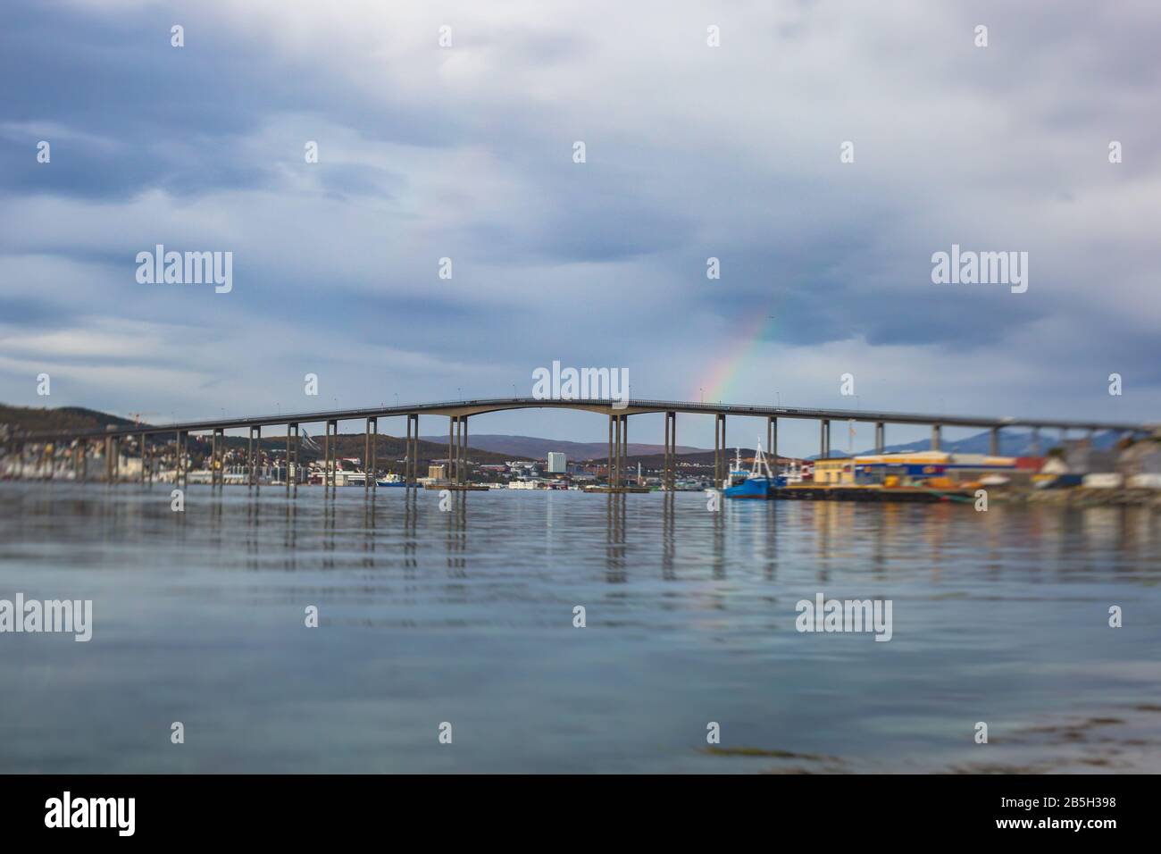 View of Tromso, with cathedral, Tromso Bridge, Tromsoya island ...