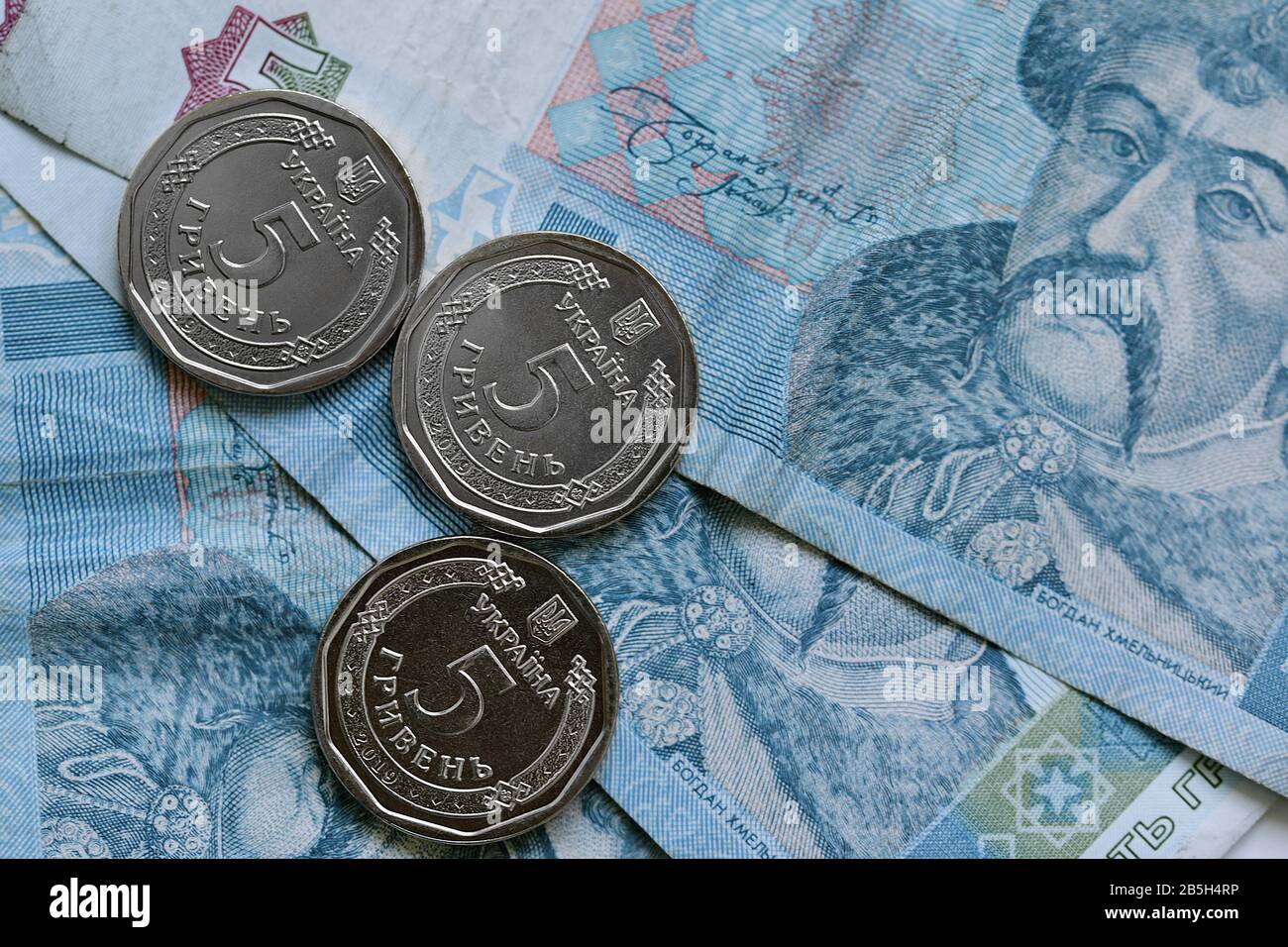 Ukranian money. Five grivna hrivnya new coins and old paper bill. Money ...