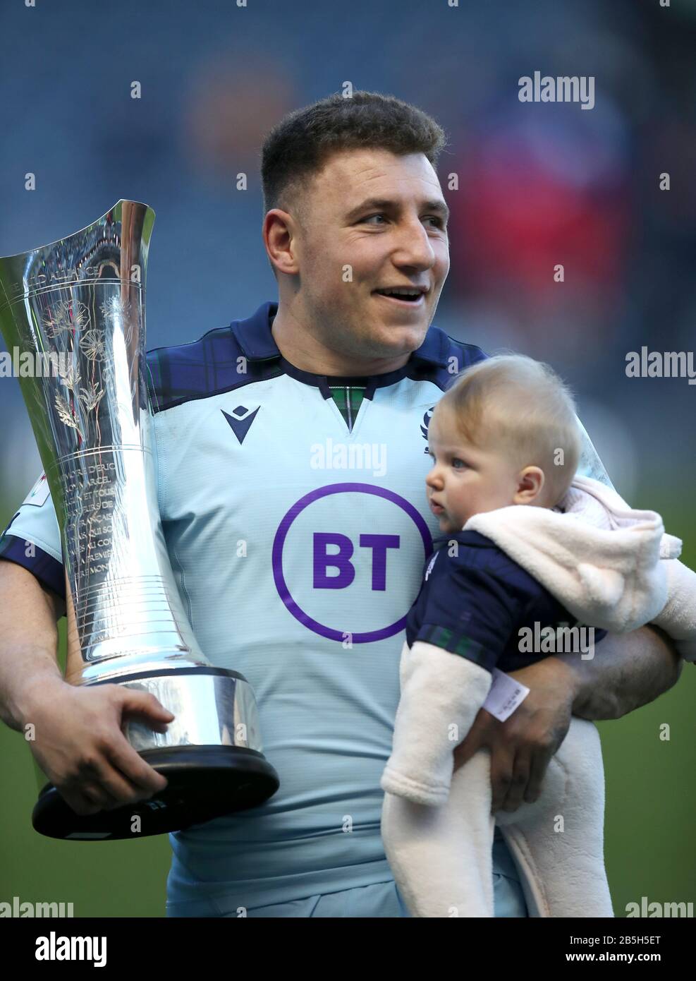Scotland's Duncan Weir with the Auld Alliance Trophy and his child ...