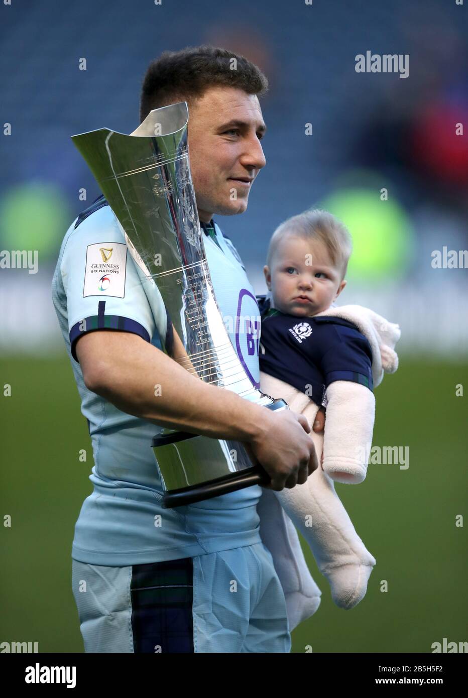 Scotland's Duncan Weir with the Auld Alliance Trophy and his child ...