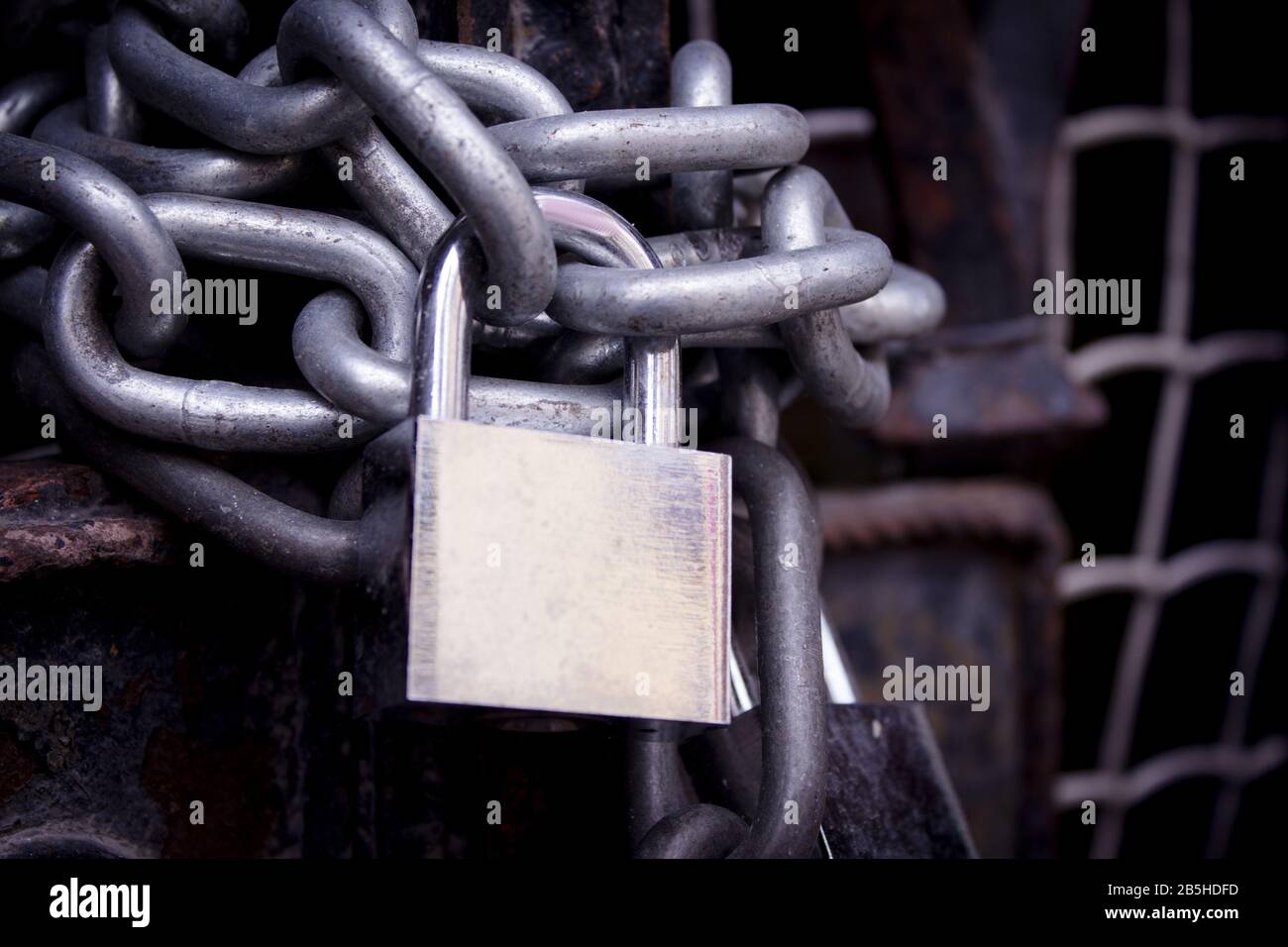 Closed door with chains and padlock Stock Photo - Alamy
