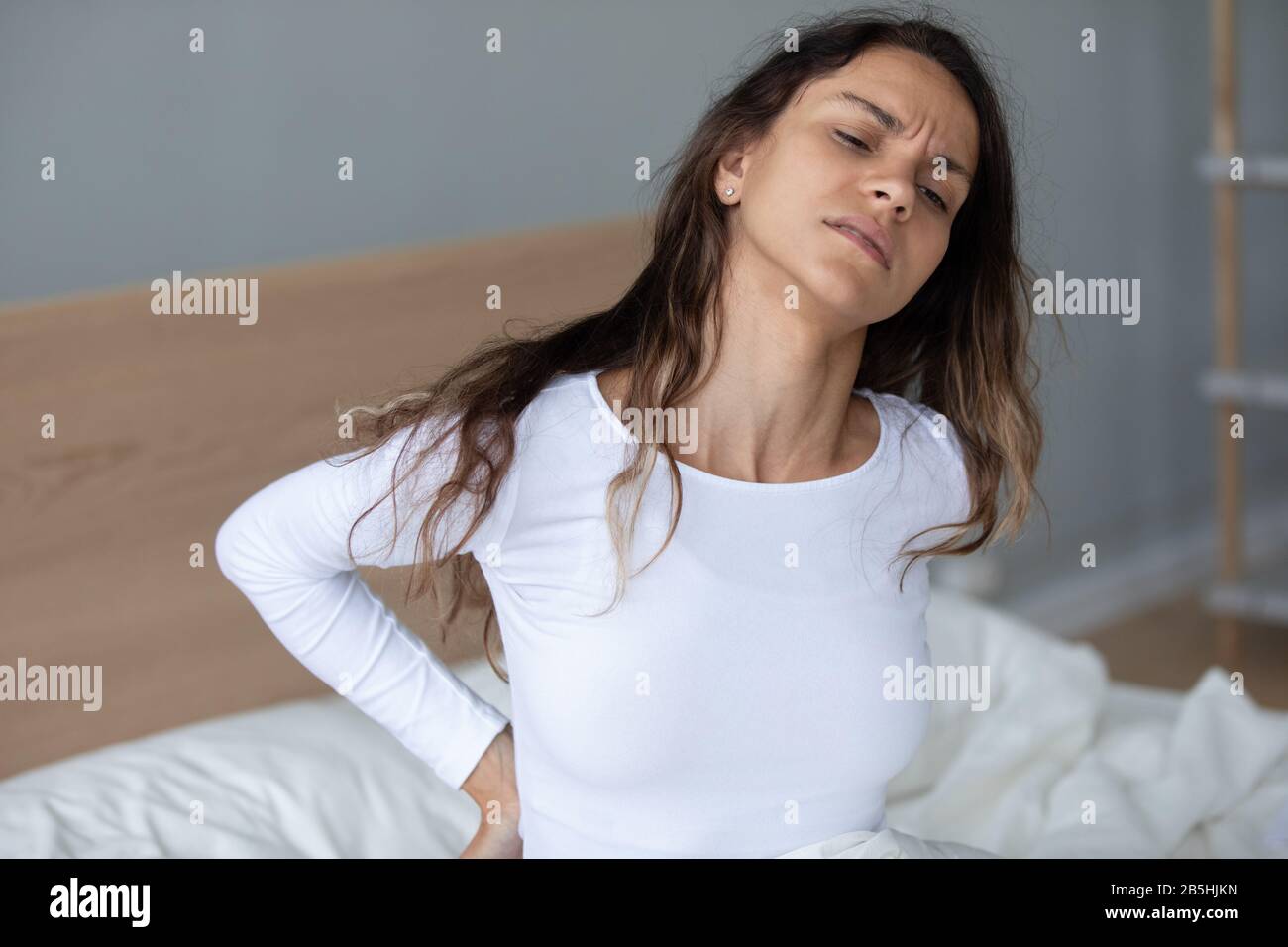 Woman backache help hi-res stock photography and images - Alamy