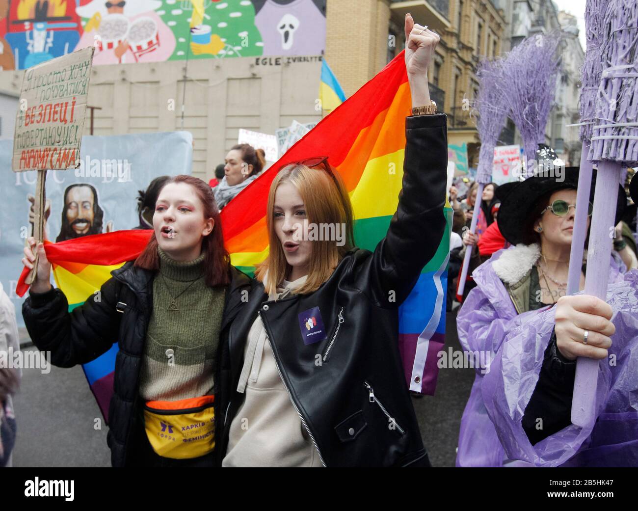 Young women carrying the LGBT flag during the march.Under the slogan ...