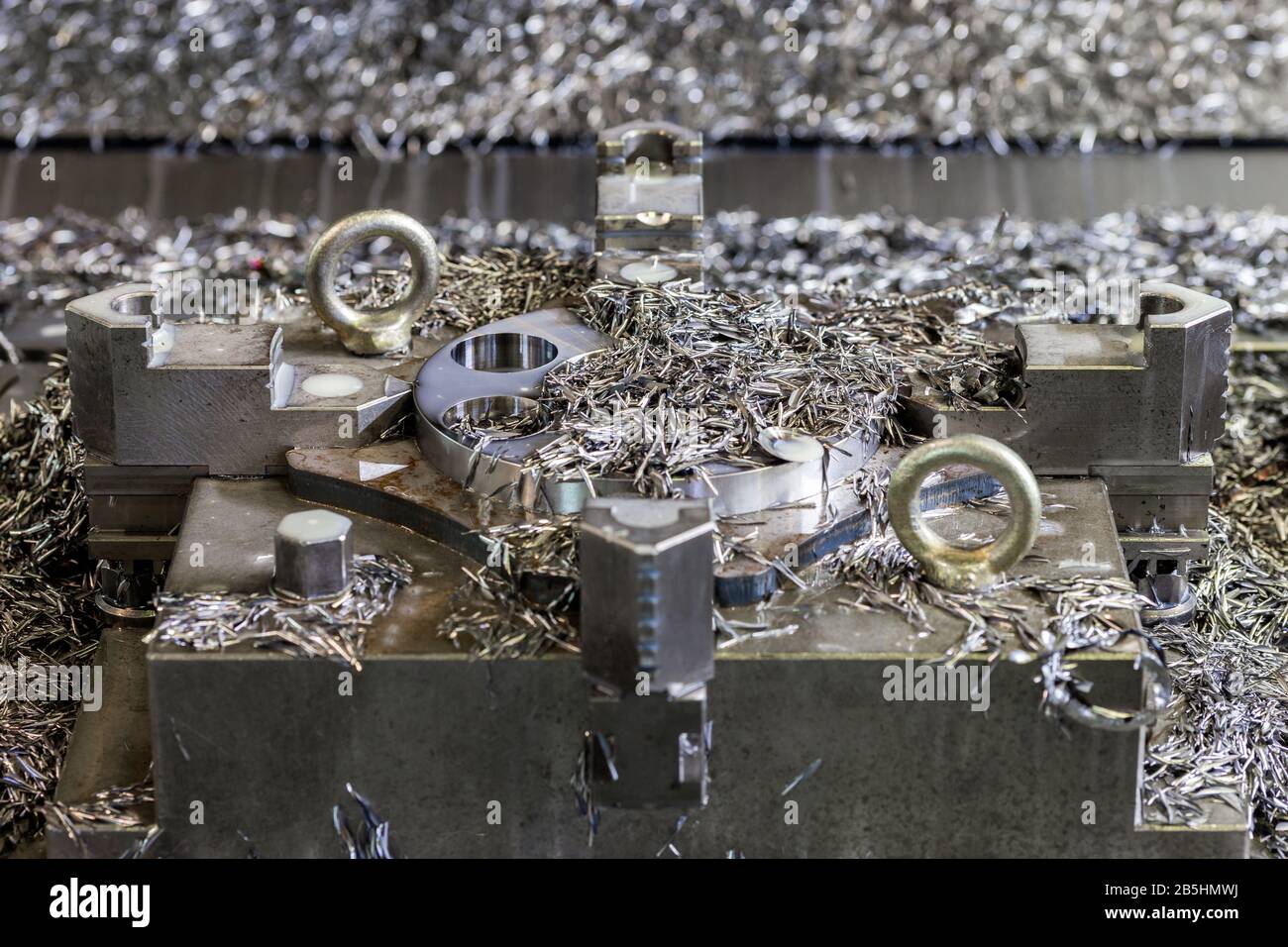 a lot of swarf and iron chips after cnc milling on workpiece and 4-jaw ...