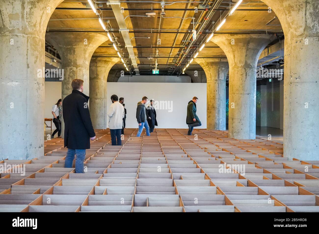 People walking on cardboard boxes inside Museum of Contemporary Art ...