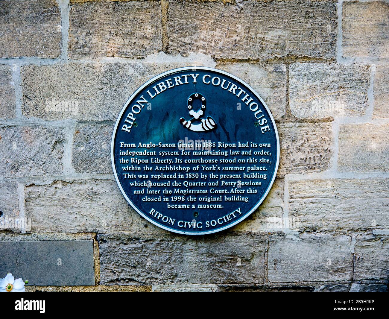 Historic area around the Cathedral in Ripon with plaques of important ...