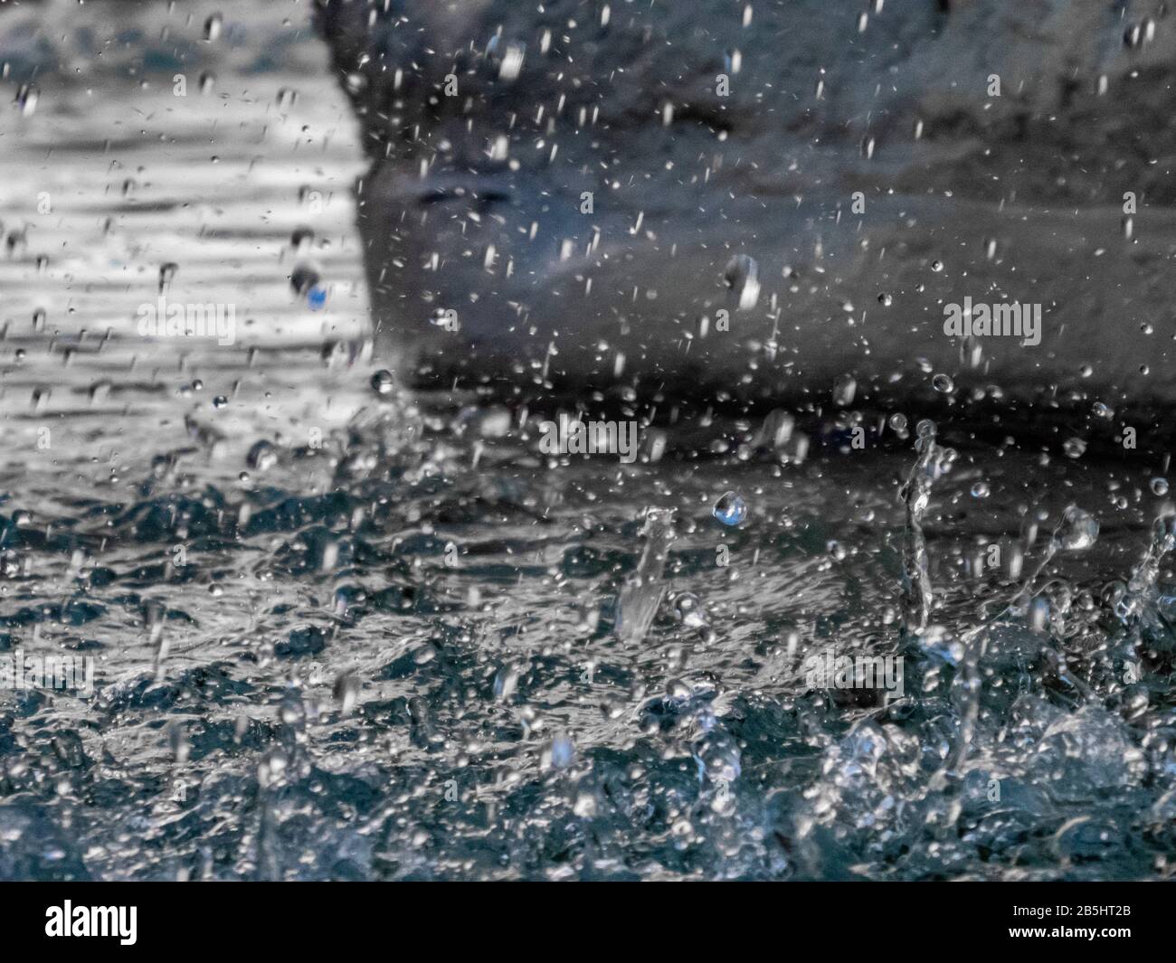 heavy, storm-laden clouds coming over a city in Brazil, a giant cluster ...