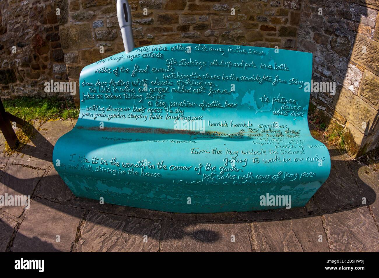 Steel 'Paper and Pen' Bench with embossed wording of village memories ...