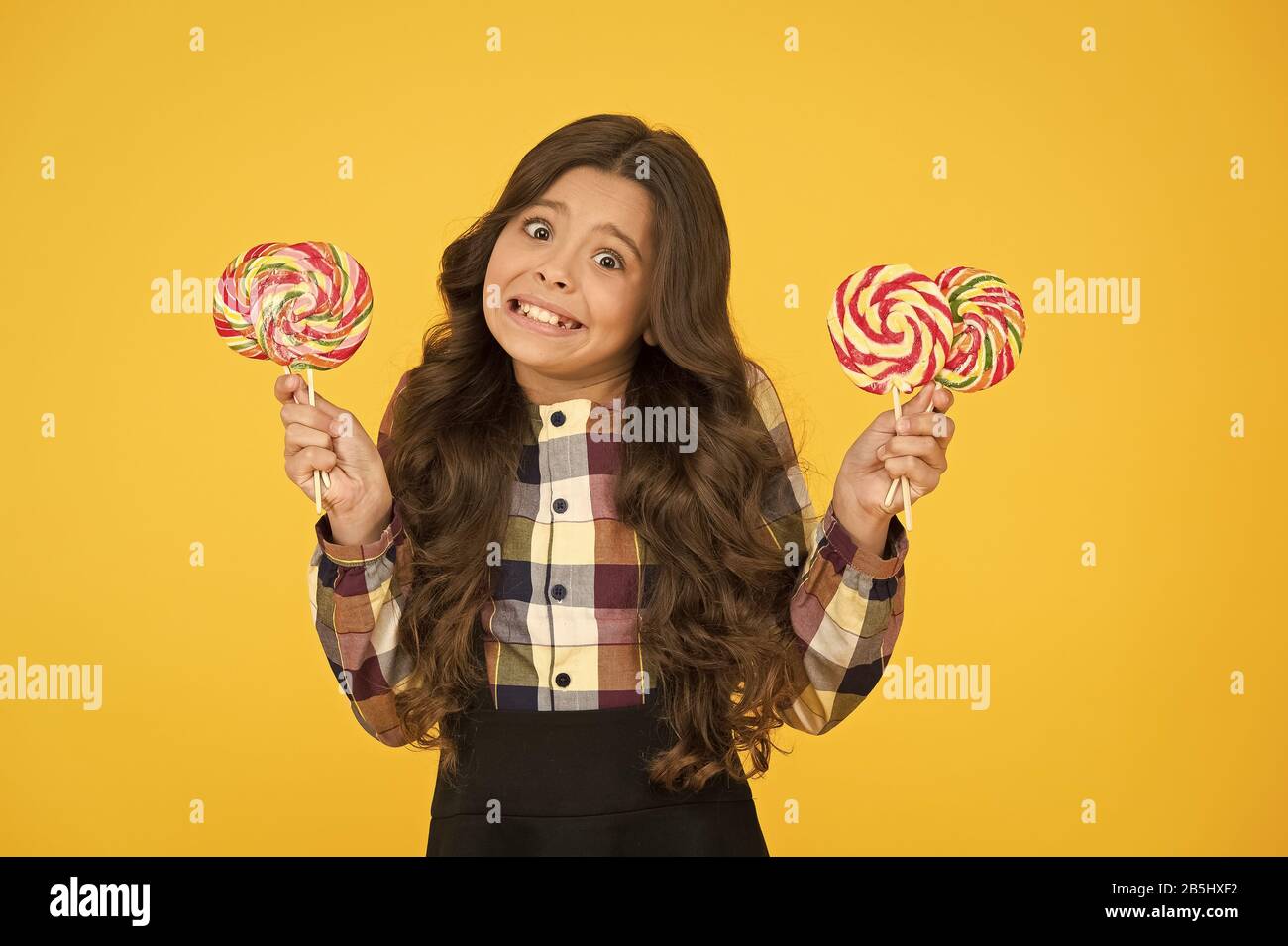 Breaking diet. Happy kid with candy. School nutrition. Calories and ...