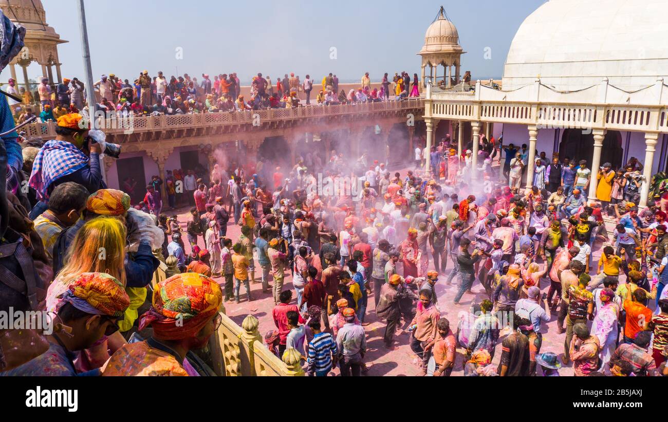 Mathura holi festival. people celebrating holi with colors Stock Photo ...