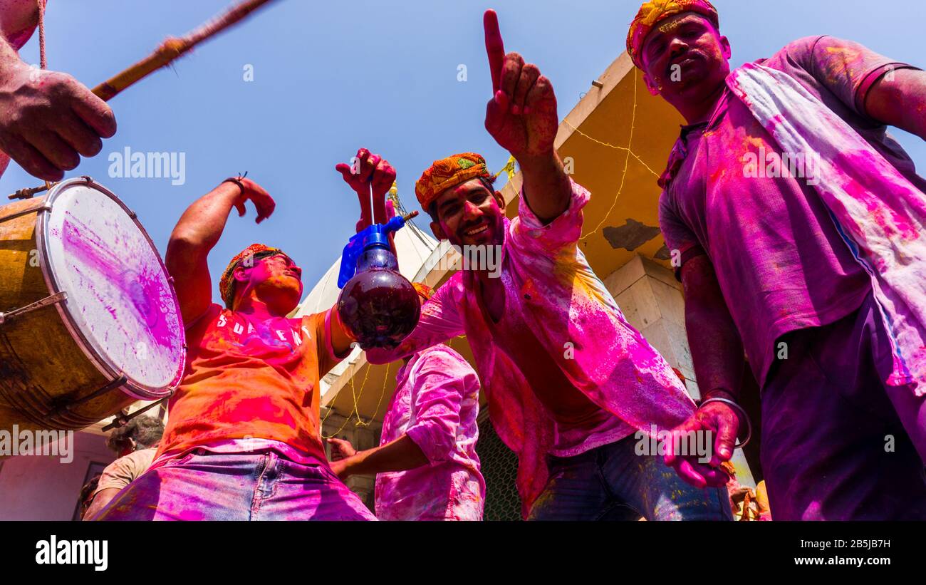Mathura holi festival. people celebrating holi with colors Stock Photo ...
