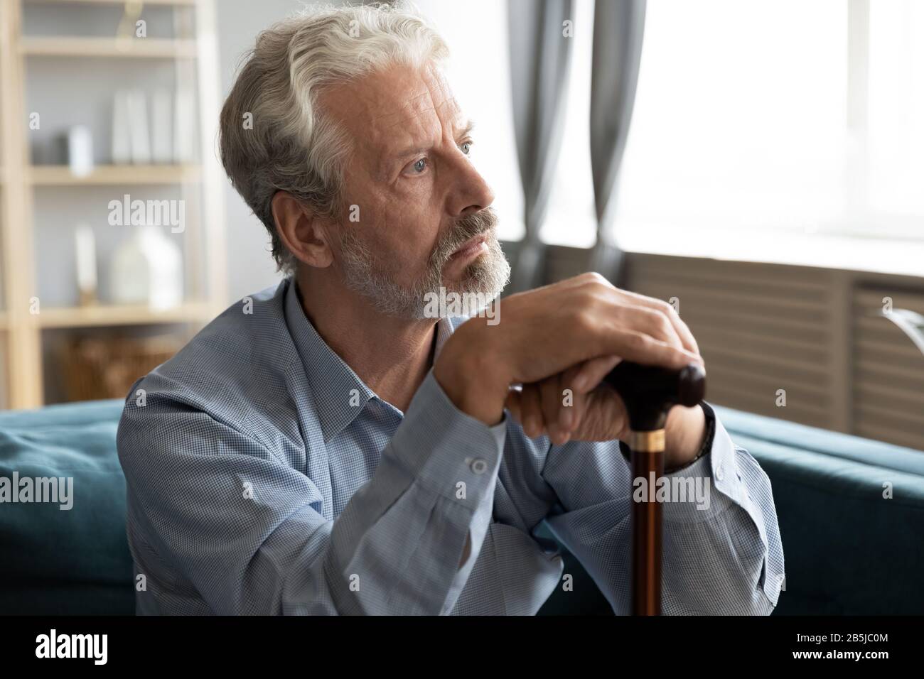 Old man with cane hi-res stock photography and images - Alamy