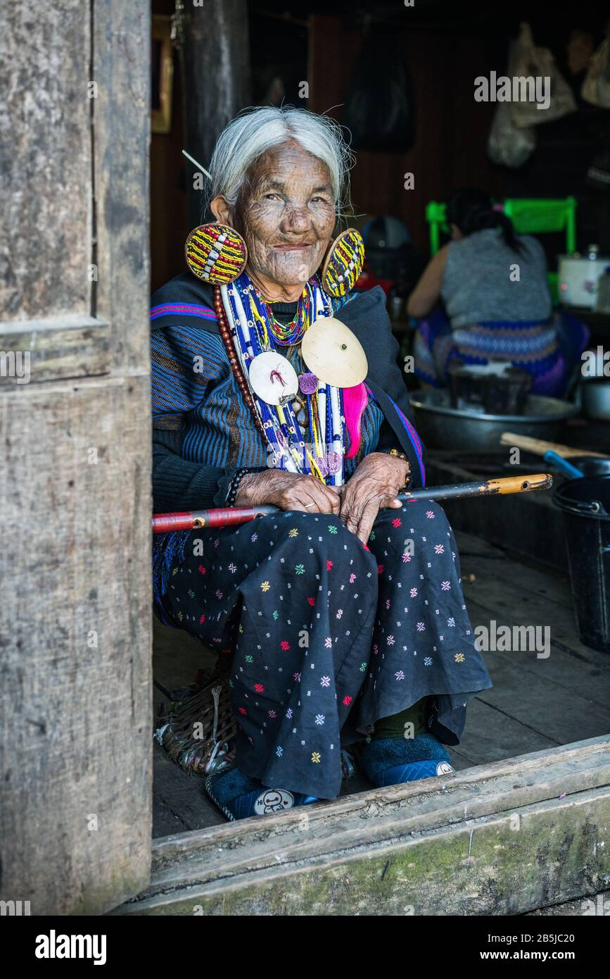 Local woman with tattooed face from village Mindat, Chin state, Myanmar ...