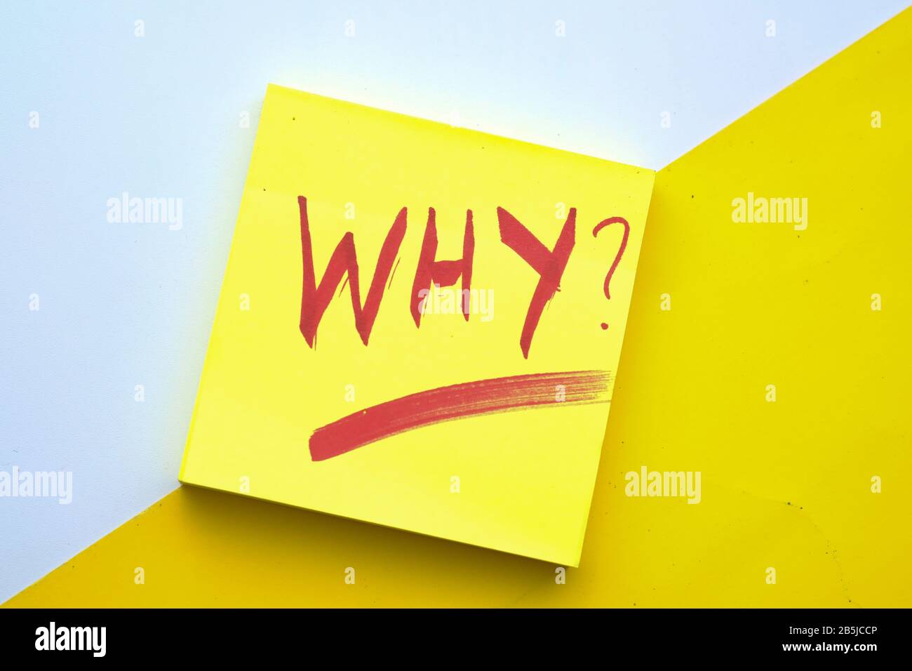 why text on yellow notepad on color background Stock Photo - Alamy