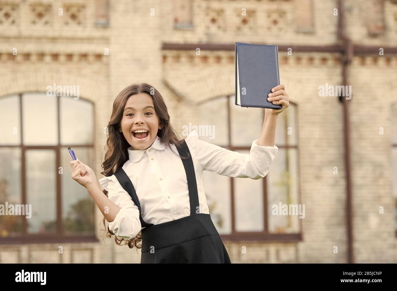 She did it. Happy schoolchild celebrate passing examination. Small ...