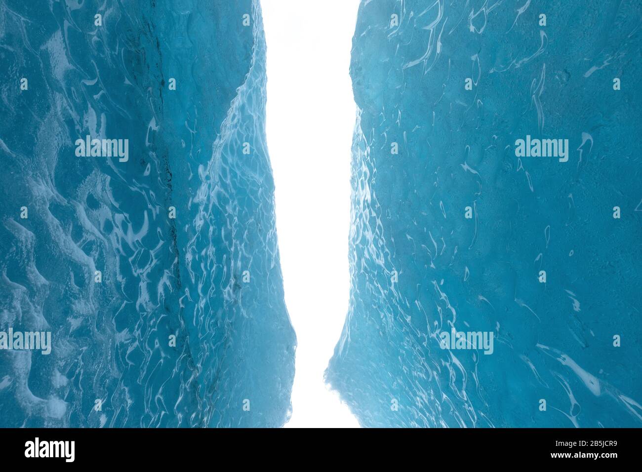 Entrance of an ice cave inside Vatnajokull glacier in southern Iceland ...