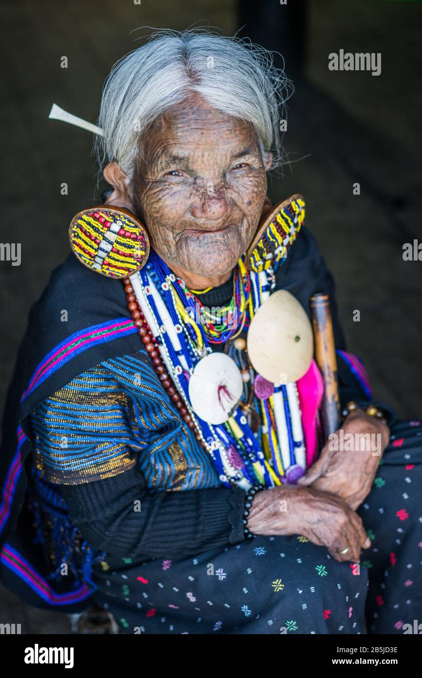 Local woman with tattooed face from village Mindat, Chin state, Myanmar ...