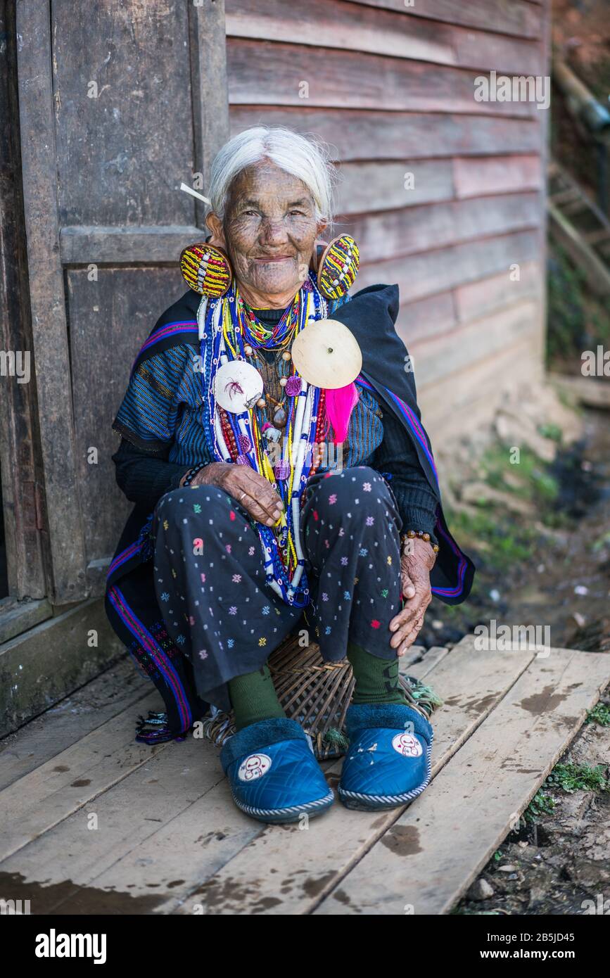 Local woman with tattooed face from village Mindat, Chin state, Myanmar ...