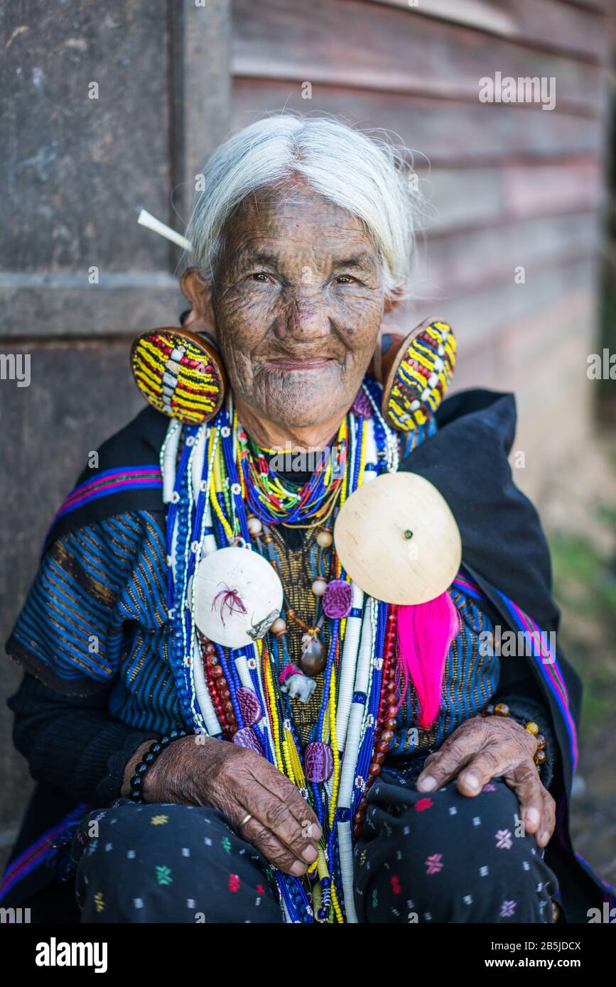 Local woman with tattooed face from village Mindat, Chin state, Myanmar ...