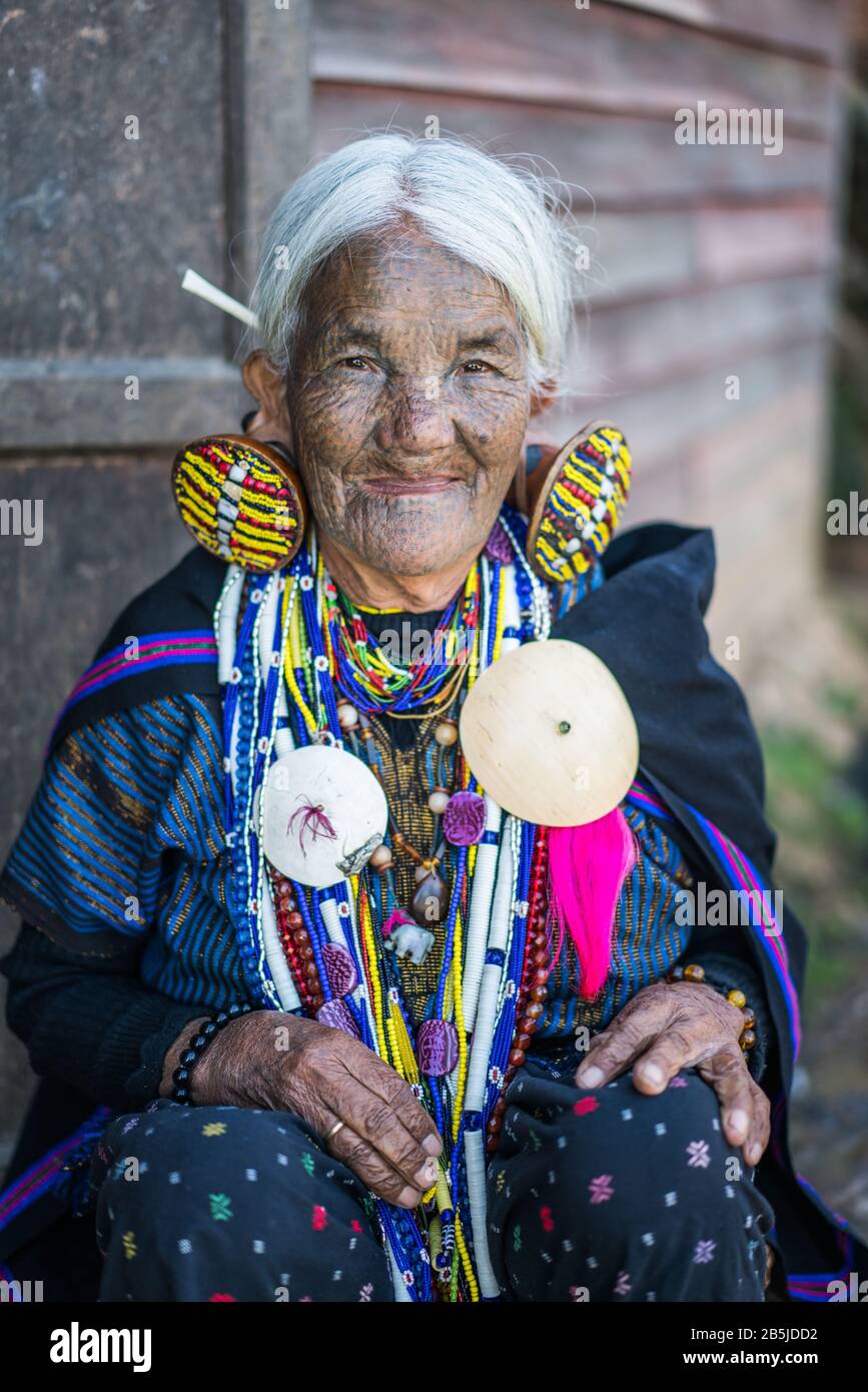 Local woman with tattooed face from village Mindat, Chin state, Myanmar ...