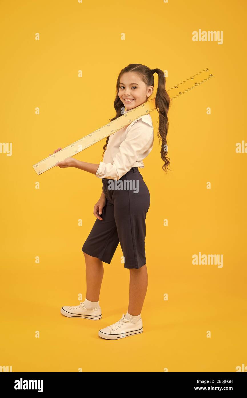 Ruler makes the drawing look better. Small child holding drawing ...