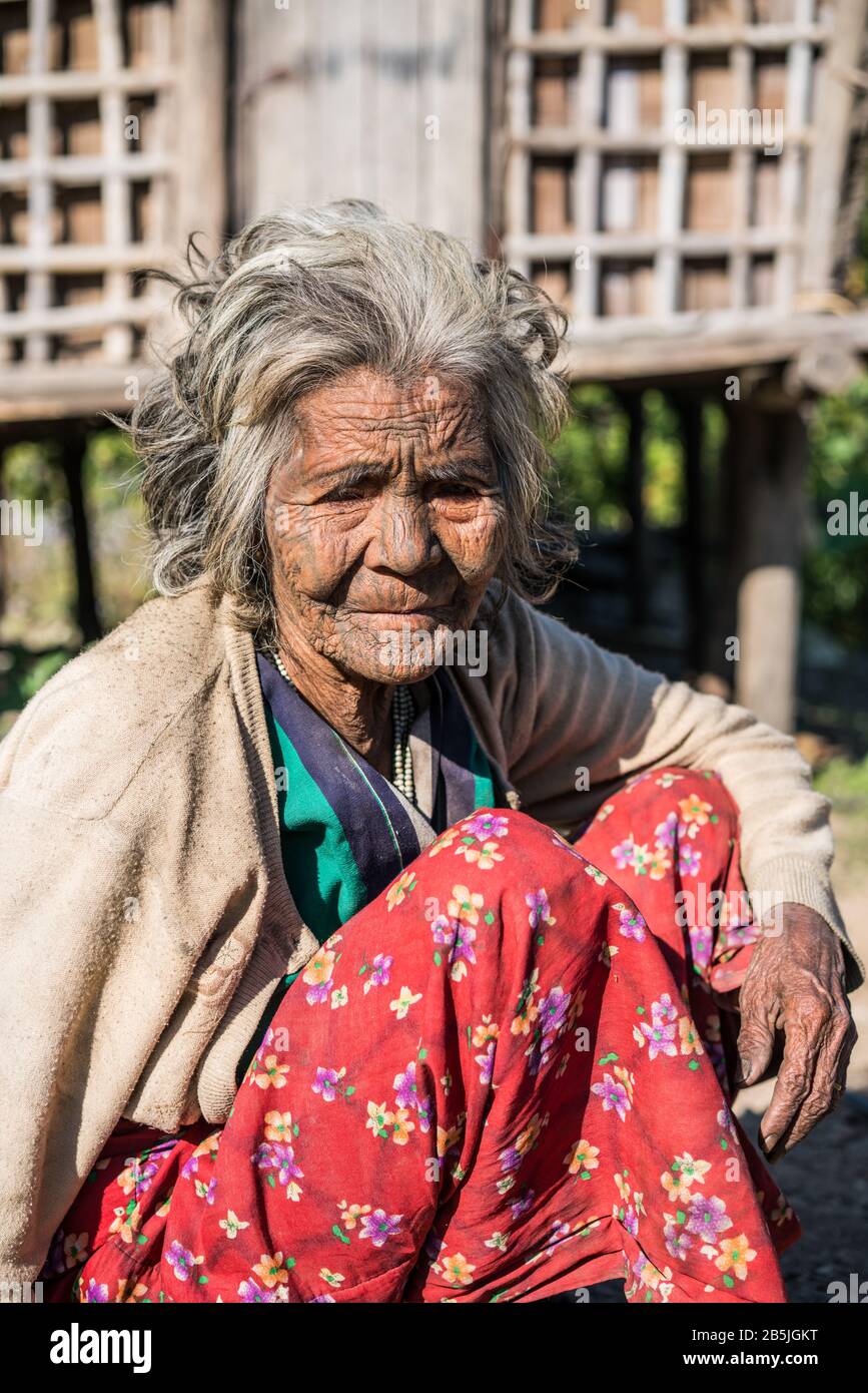 Local woman with tattooed face from village Mindat, Chin state, Myanmar ...