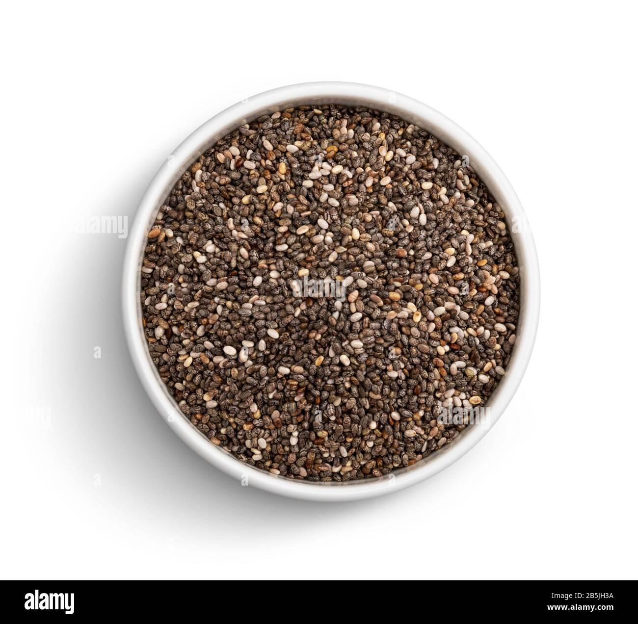 Chia seeds isolated on white background, top view Stock Photo - Alamy