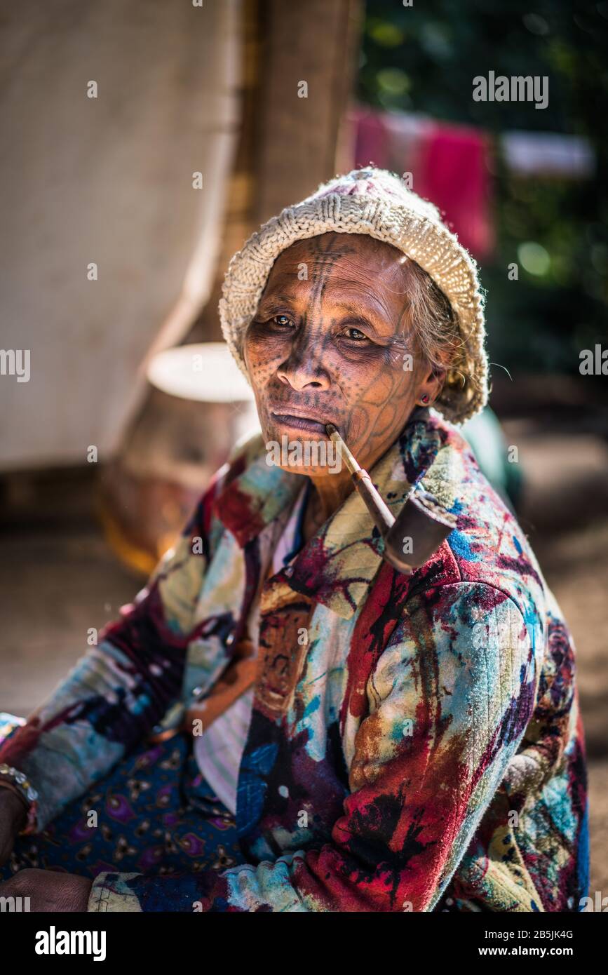 Local woman with tattooed face from village Mindat, Chin state, Myanmar ...