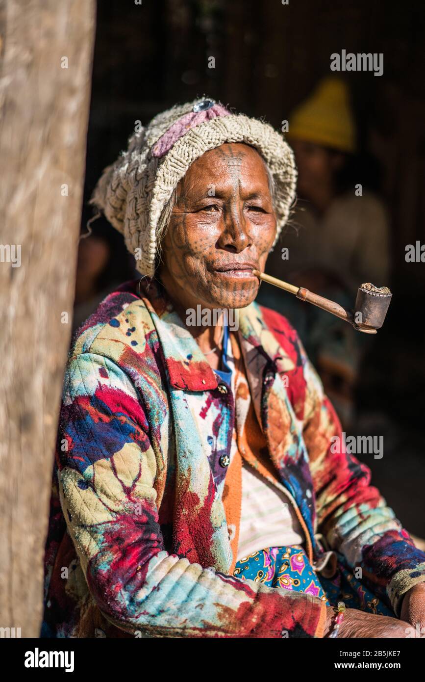 Local woman with tattooed face from village Mindat, Chin state, Myanmar ...