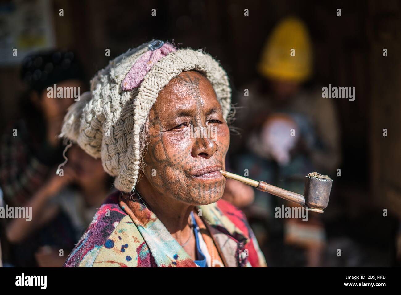Local woman with tattooed face from village Mindat, Chin state, Myanmar ...