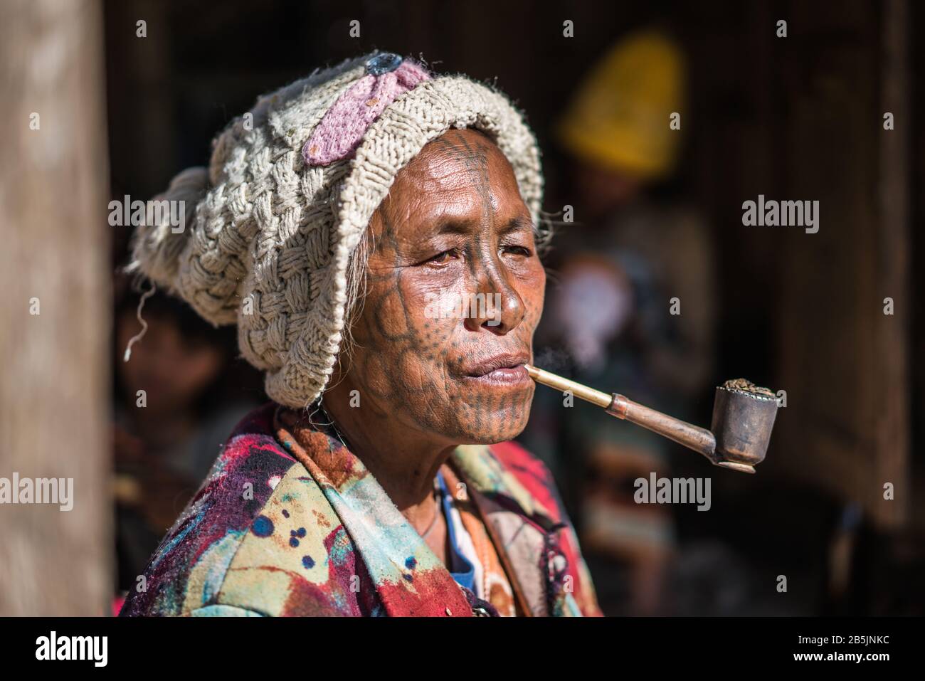 Local woman with tattooed face from village Mindat, Chin state, Myanmar ...