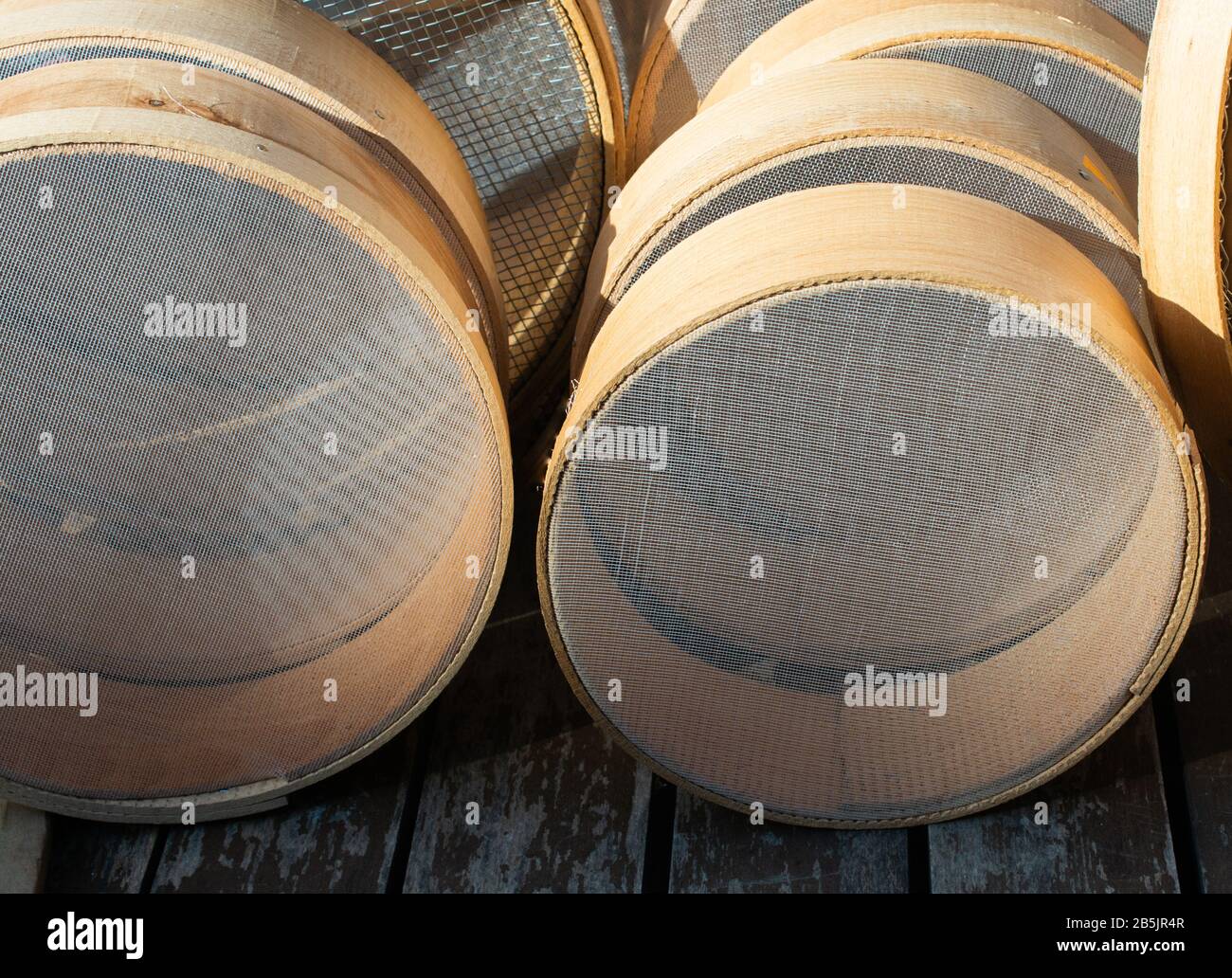 Traditional type sieves made of wood Stock Photo - Alamy