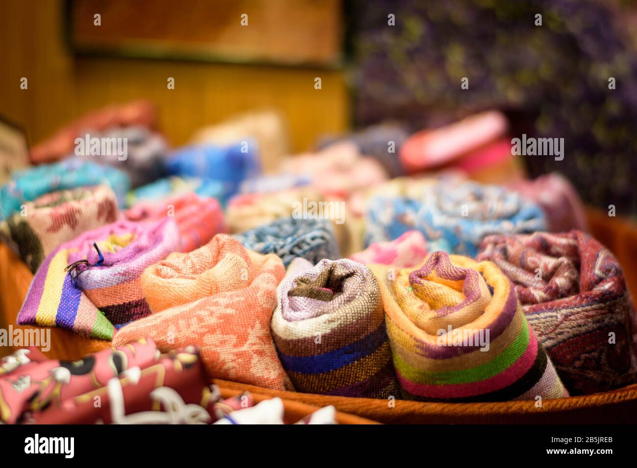 Colorful Fabric Blankets on display at market Stock Photo - Alamy
