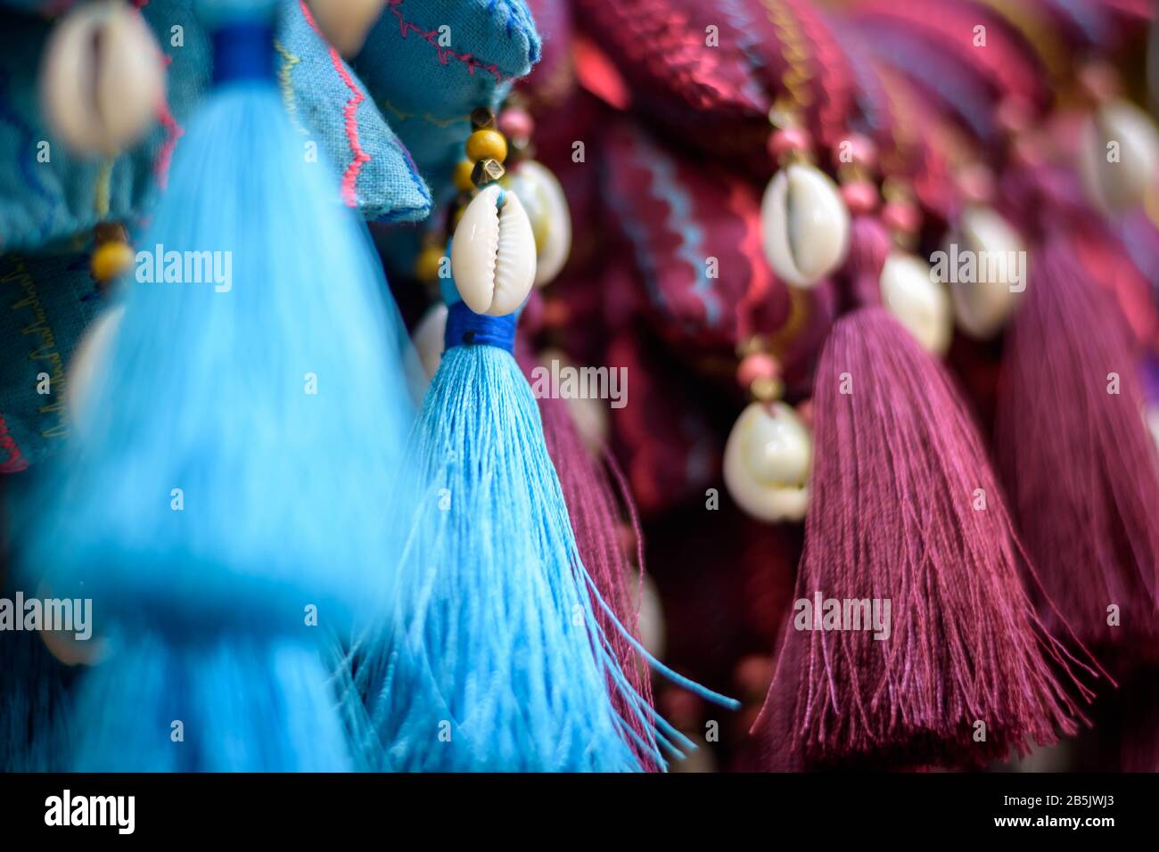 red, pink and purple string balls key chain hanged in bundle Stock ...