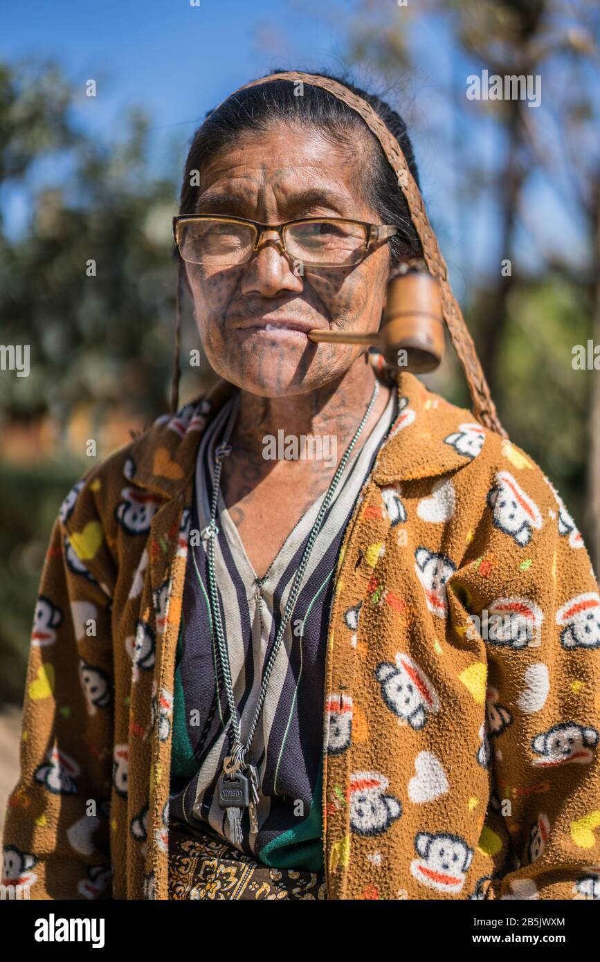 Local woman with tattooed face from village Mindat, Chin state, Myanmar ...