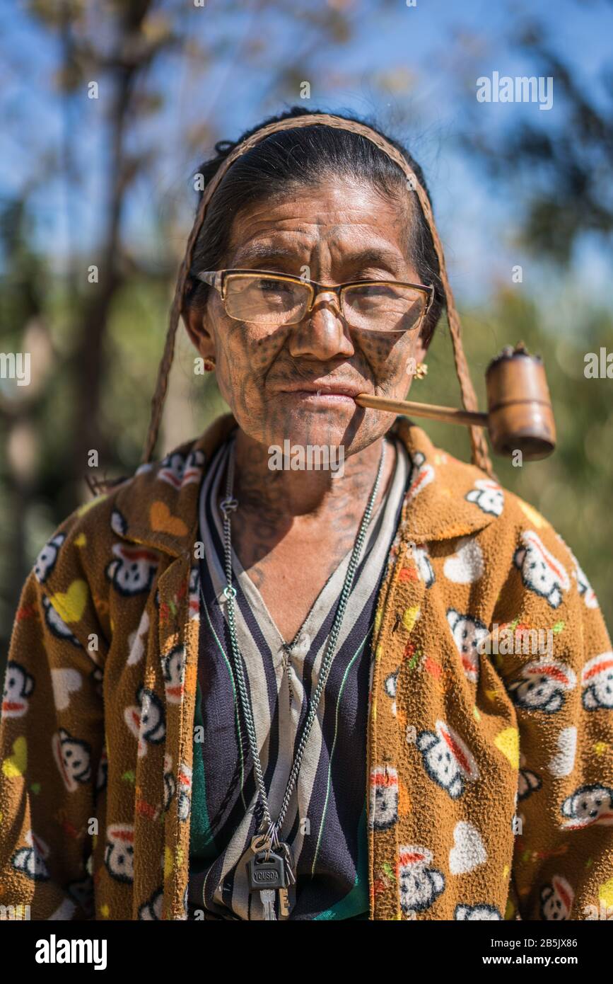 Local woman with tattooed face from village Mindat, Chin state, Myanmar ...