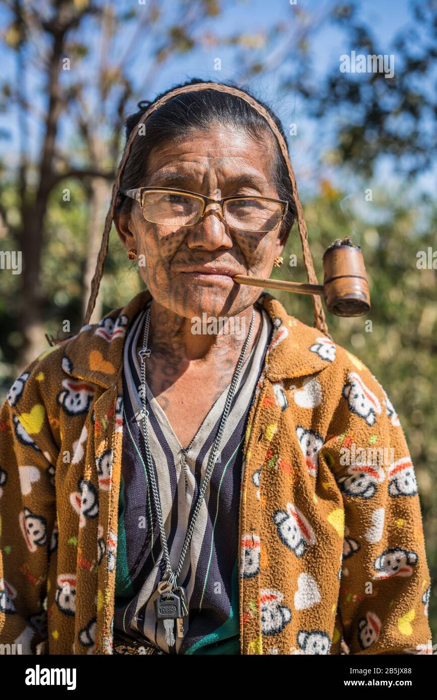 Local woman with tattooed face from village Mindat, Chin state, Myanmar ...