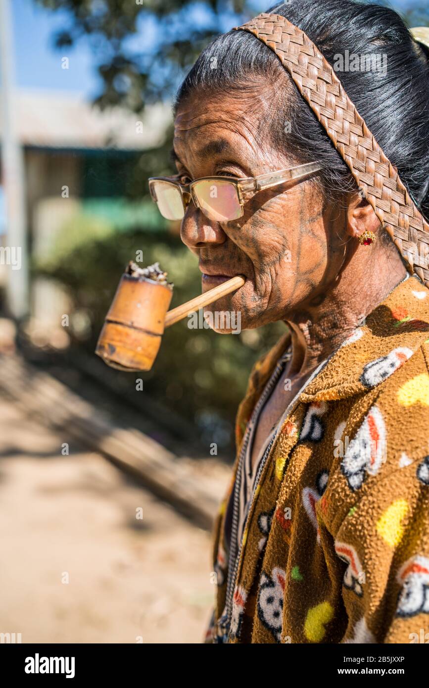 Local woman with tattooed face from village Mindat, Chin state, Myanmar ...